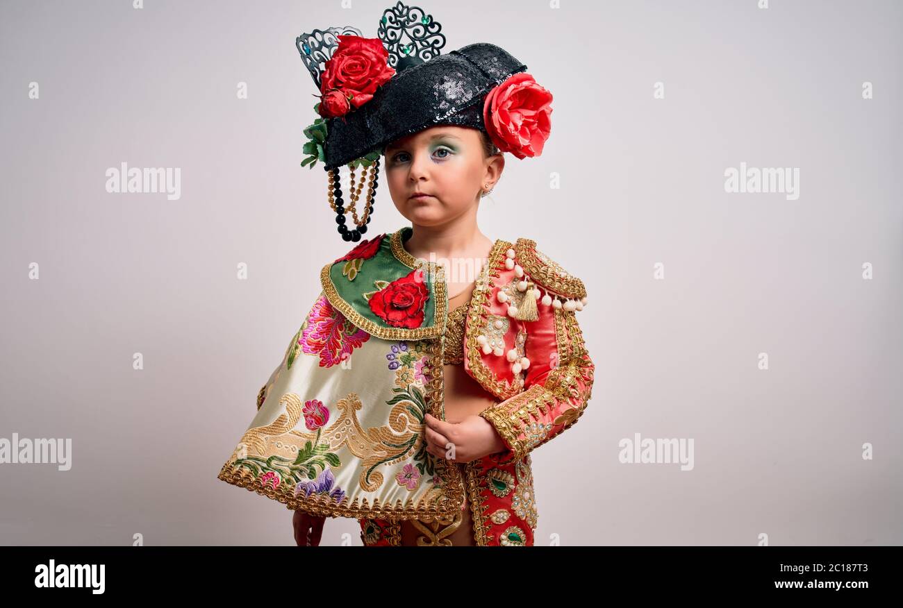 Young little caucasian kid girl wearing bullfighter traditional folkore ...