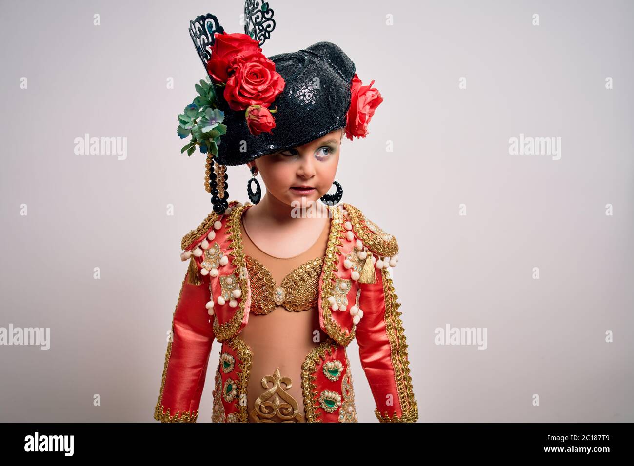 Young little caucasian kid girl wearing bullfighter traditional folkore ...