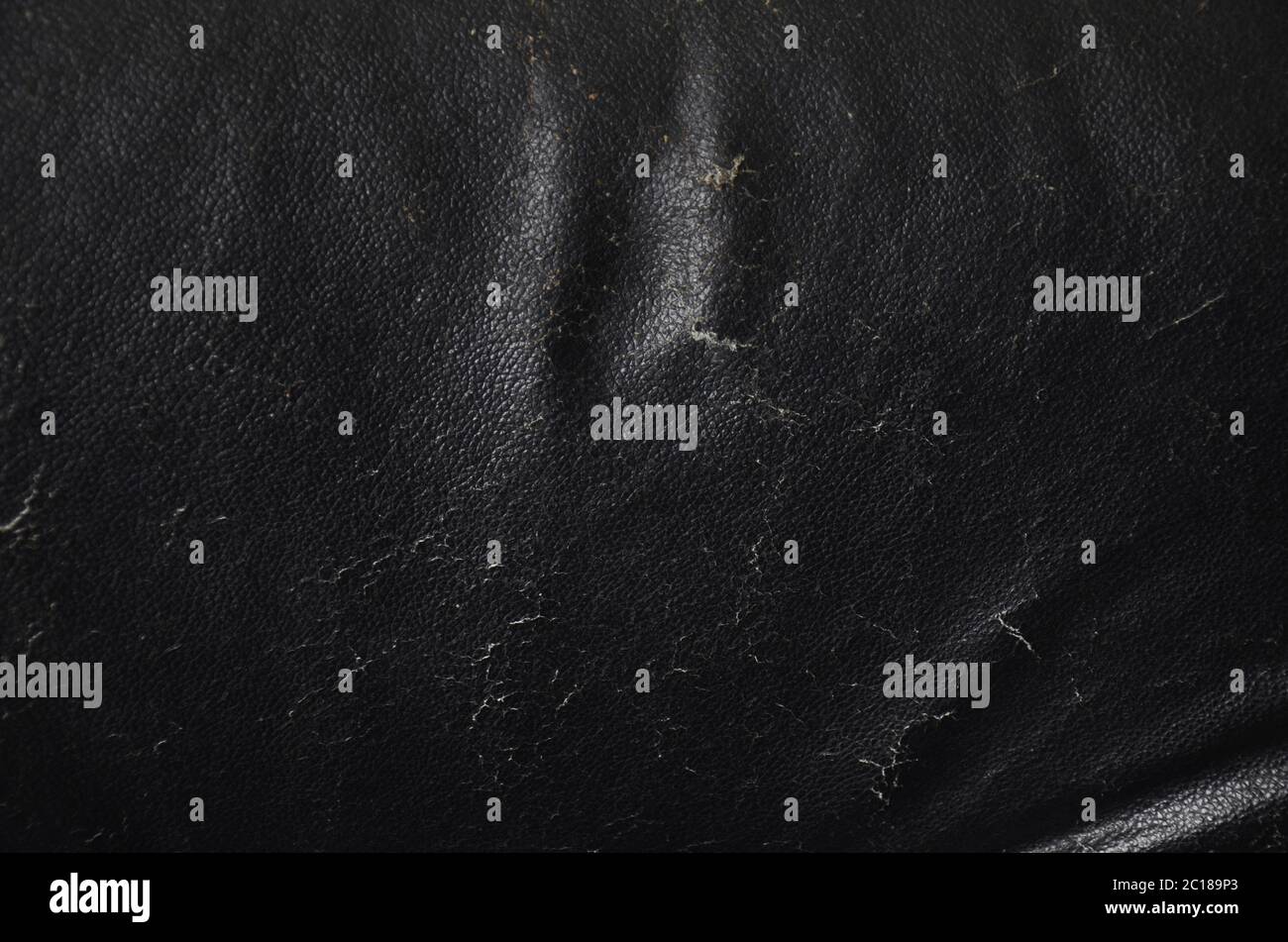 Torn black leather seat included sponge inside. Upholstery, ripped and ...