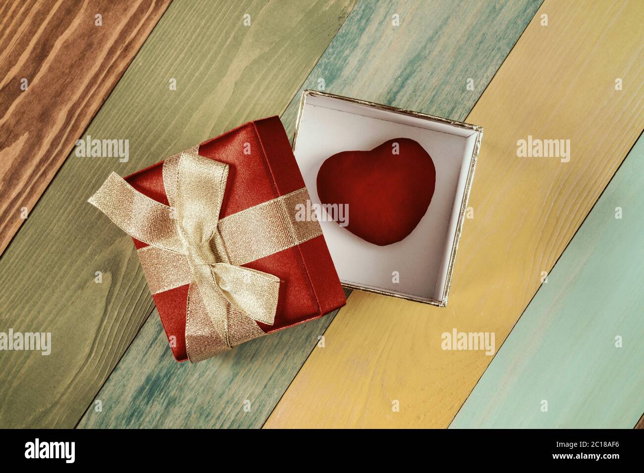 Gift box with heart inside Stock Photo - Alamy