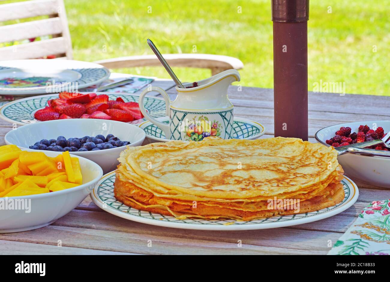 Stack of crepes with fresh fruit Stock Photo - Alamy