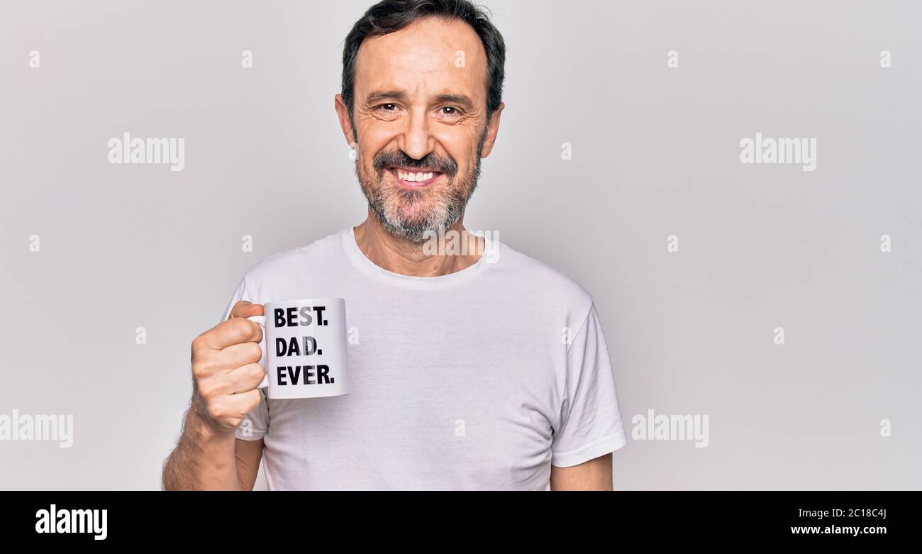 Middle age handsome man drinking cup of coffee with best dad ever ...