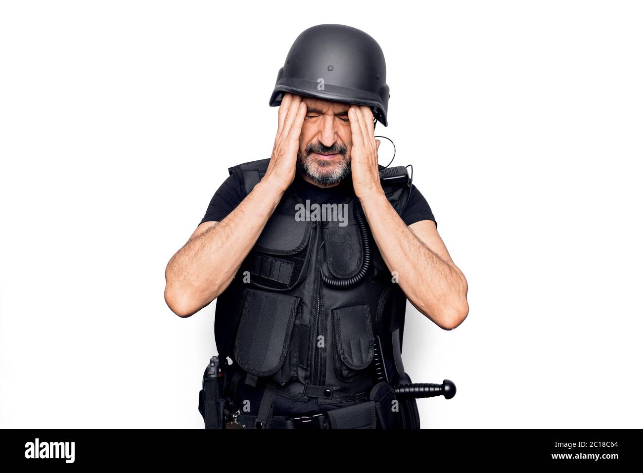 Middle age handsome policeman wearing police bulletproof vest and ...