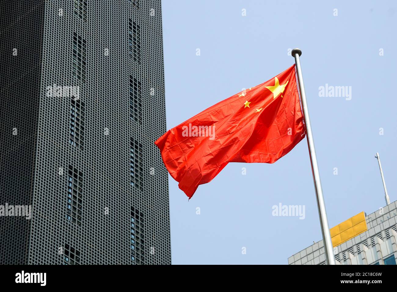 red flag waves in the wind Stock Photo - Alamy