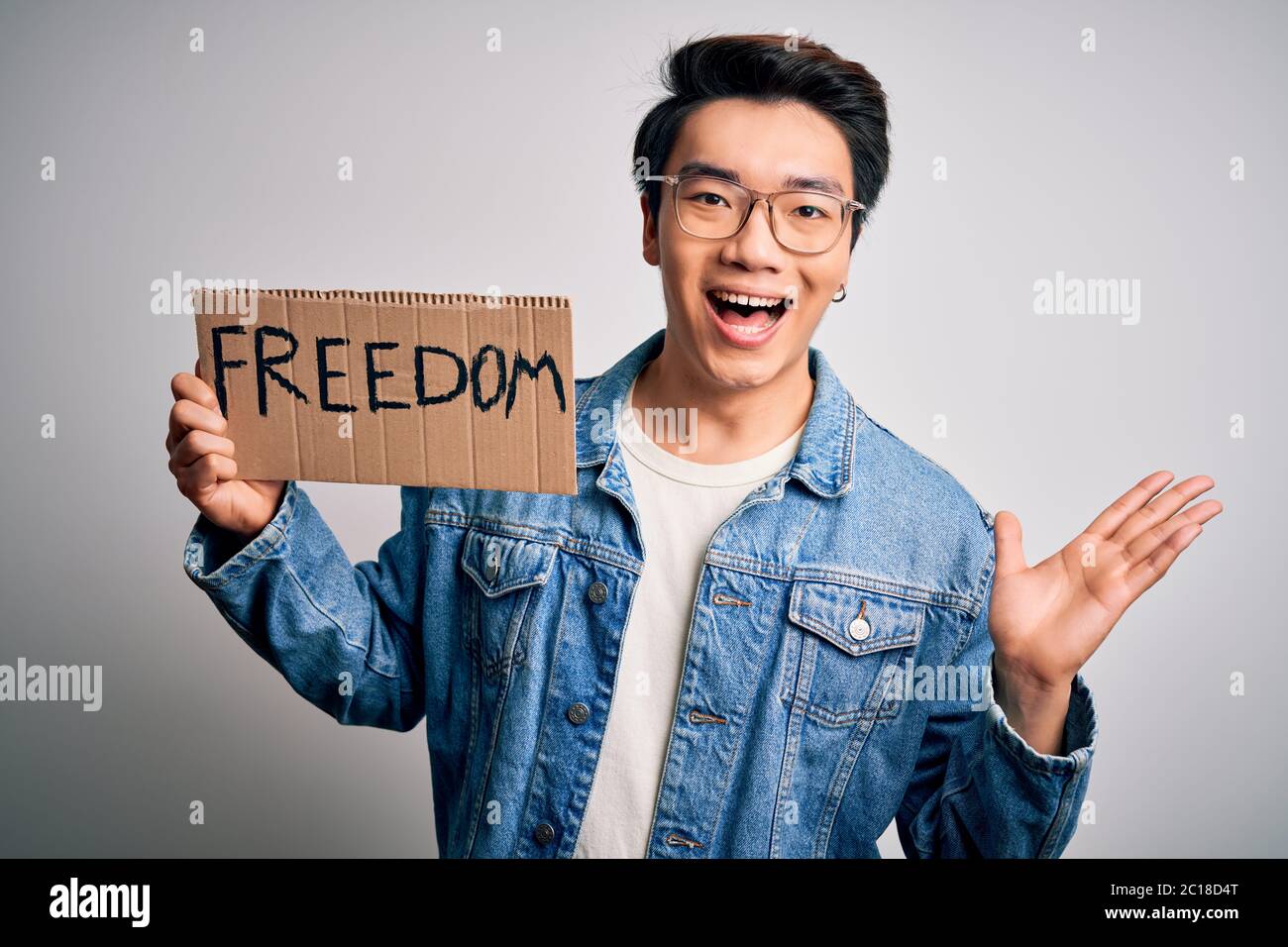 Young handsome chinese activist man protesting asking for freedom ...