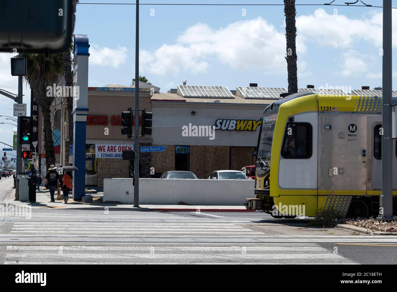 Long Beach, CA/USA - June 6, 2020: A Metro Light Rail Train approaches ...