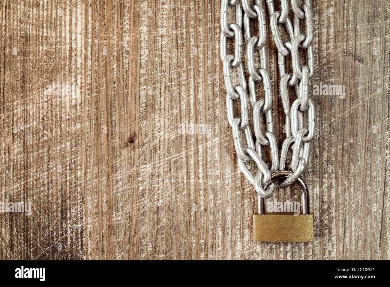 Chain with locked lock Stock Photo - Alamy