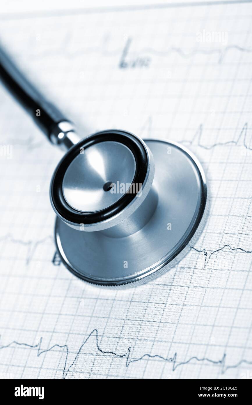 Close up view of stethoscope on electrocardiogram background Stock ...