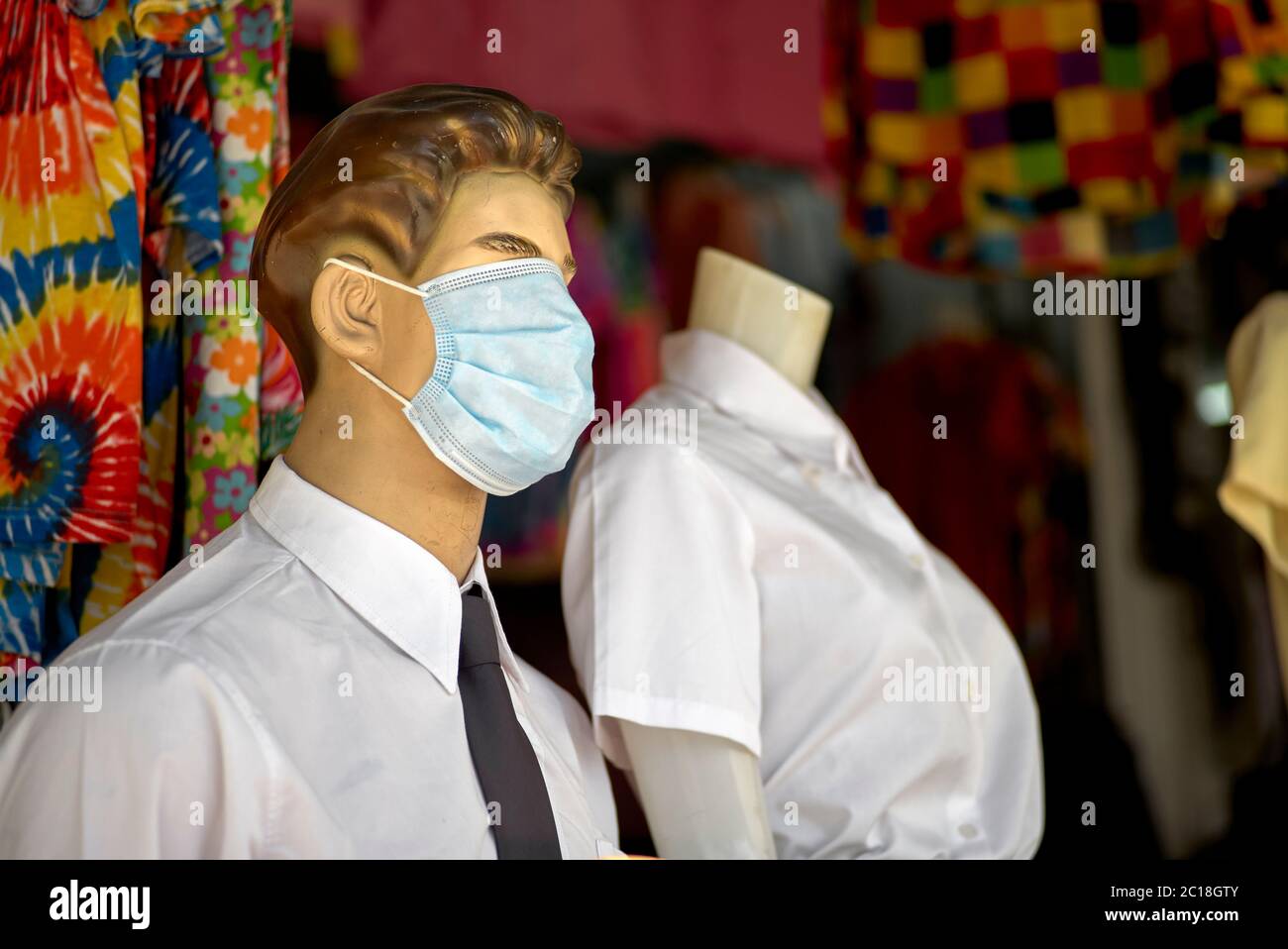 COVID-19 mask ; Mannequin wearing a Coronavirus protective face mask ...