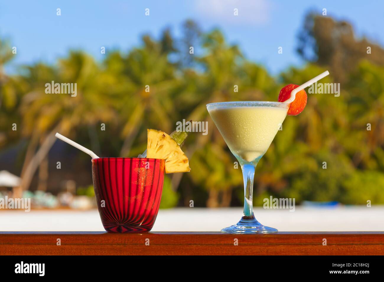 Fruit cocktail on Maldives beach Stock Photo - Alamy