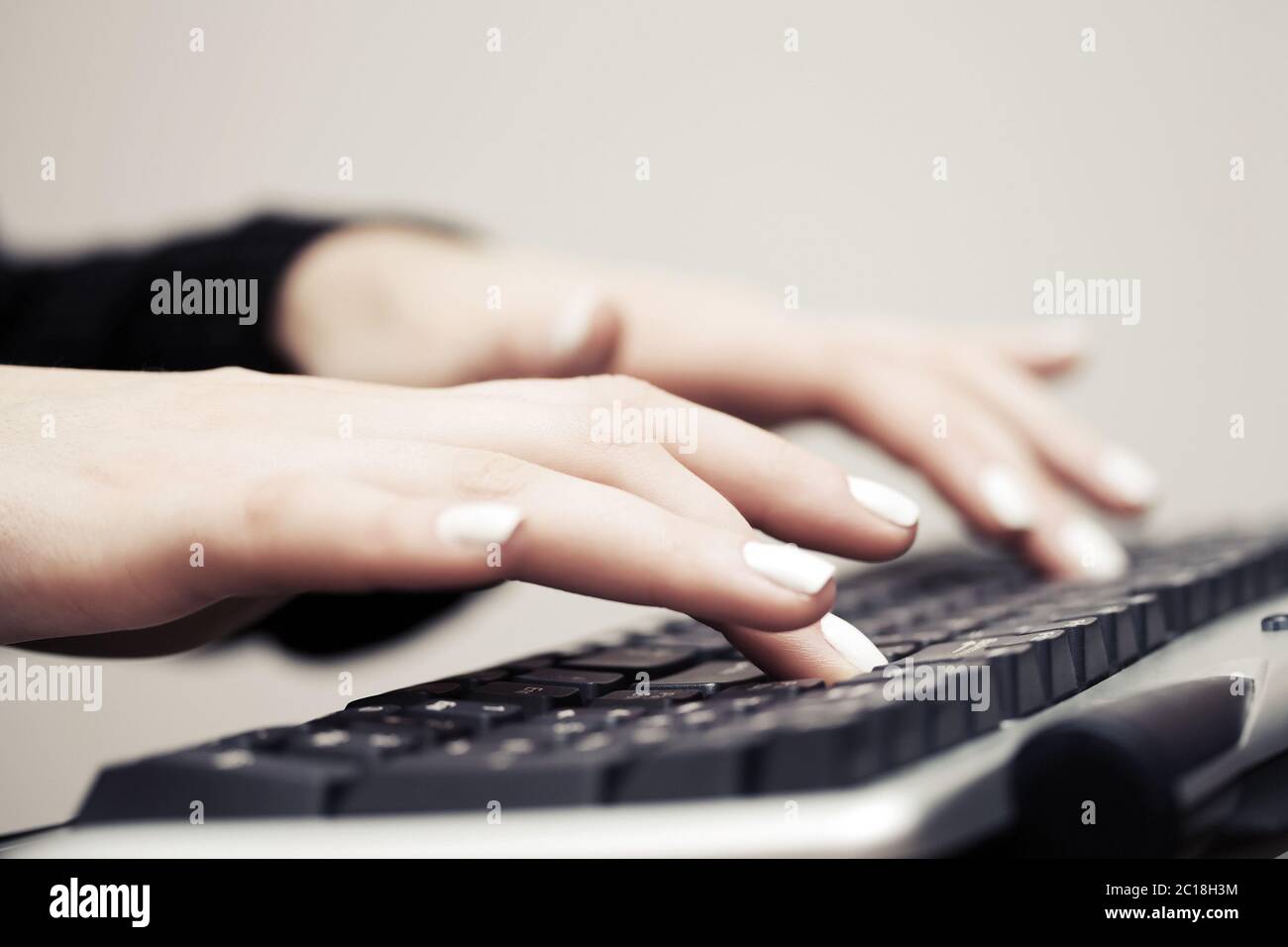 Black woman typing at computer hi-res stock photography and images - Alamy