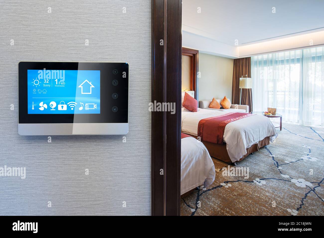 smart screen with modern twin bed room Stock Photo - Alamy