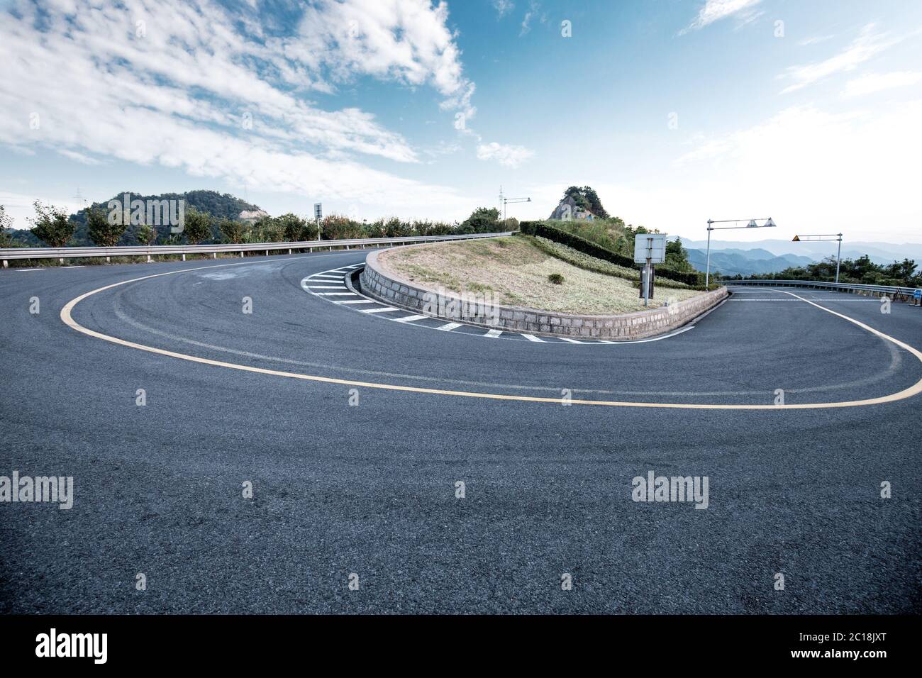 empty asphalt sharp turn Stock Photo - Alamy