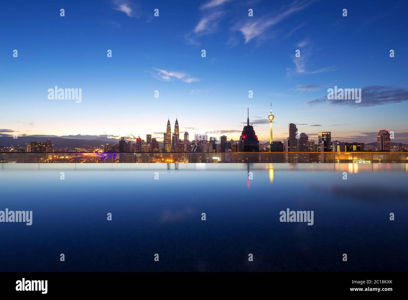 tranquil pool with modern buildings in midtown of modern city Stock ...