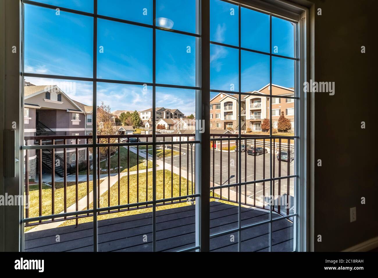 Urban street viewed through a cottage pane window Stock Photo - Alamy