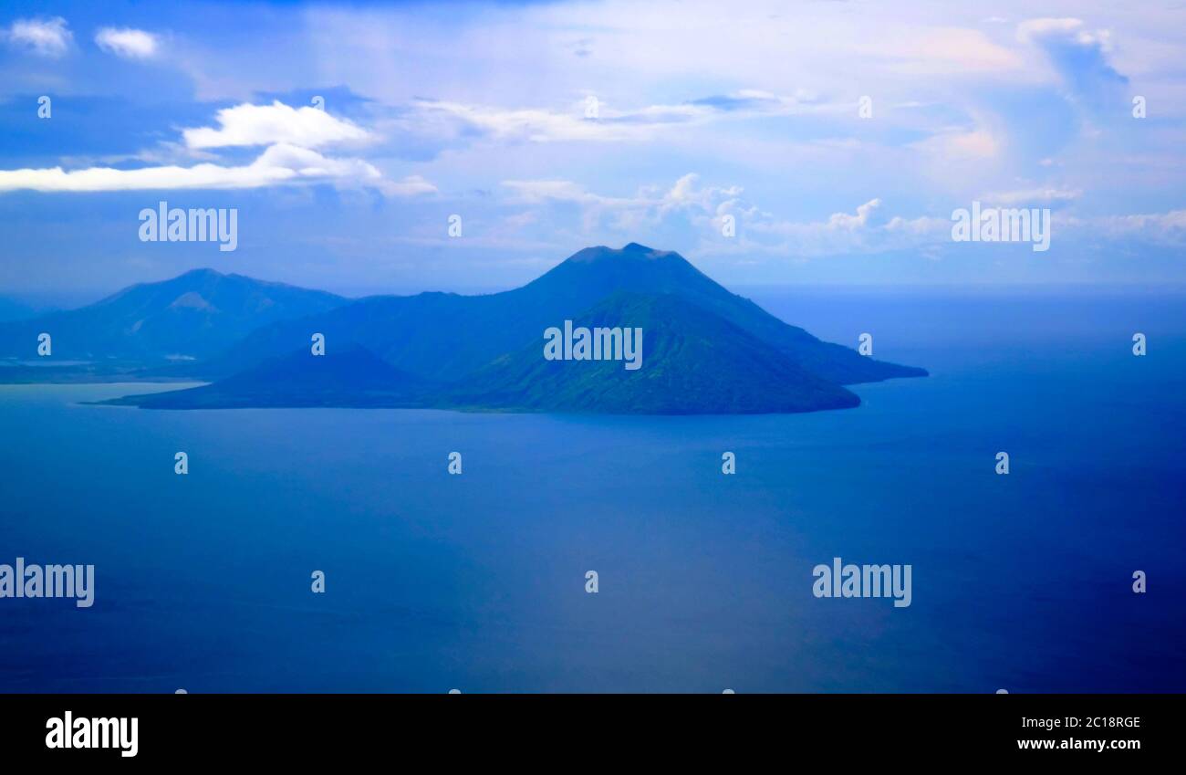 Aerial view to Tavurvur volcano, Rabaul, New Britain island, Papua New ...