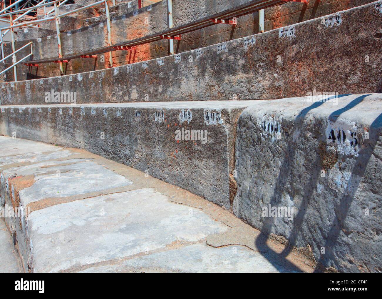 The restored ancient amphitheater with stone seats Stock Photo - Alamy