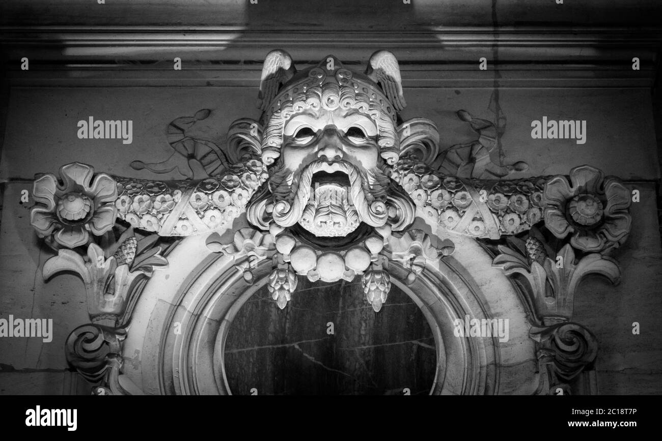 Bas relief from old building stone face Stock Photo - Alamy