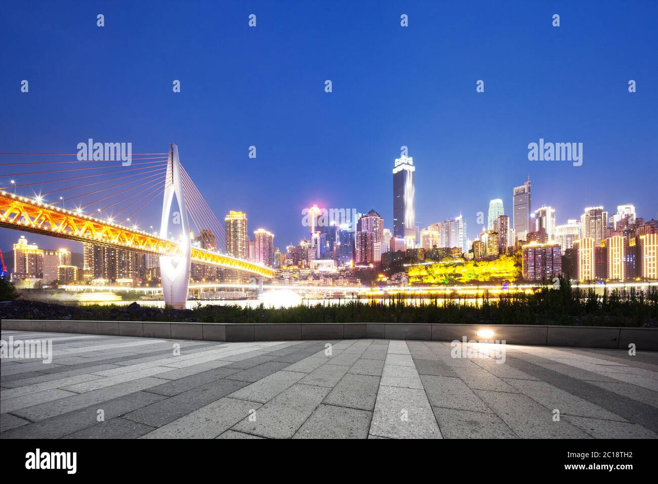 empty marble floor with modern bridge and modern city Stock Photo - Alamy