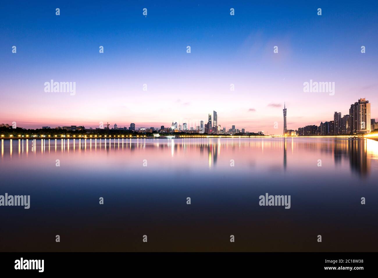 modern buildings near water in modern city Stock Photo - Alamy