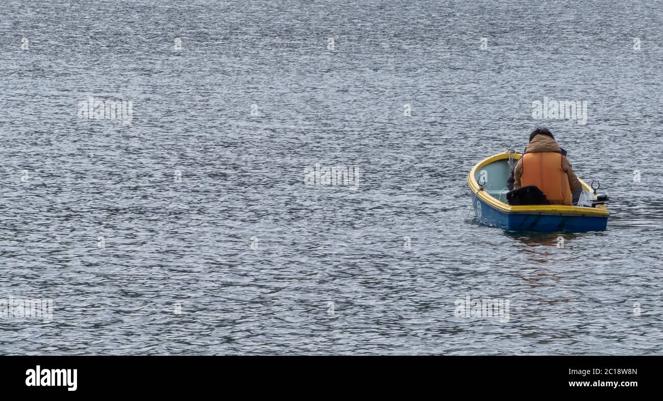 Man boating at Lake Chuzenji, Nikko, Japan Stock Photo - Alamy
