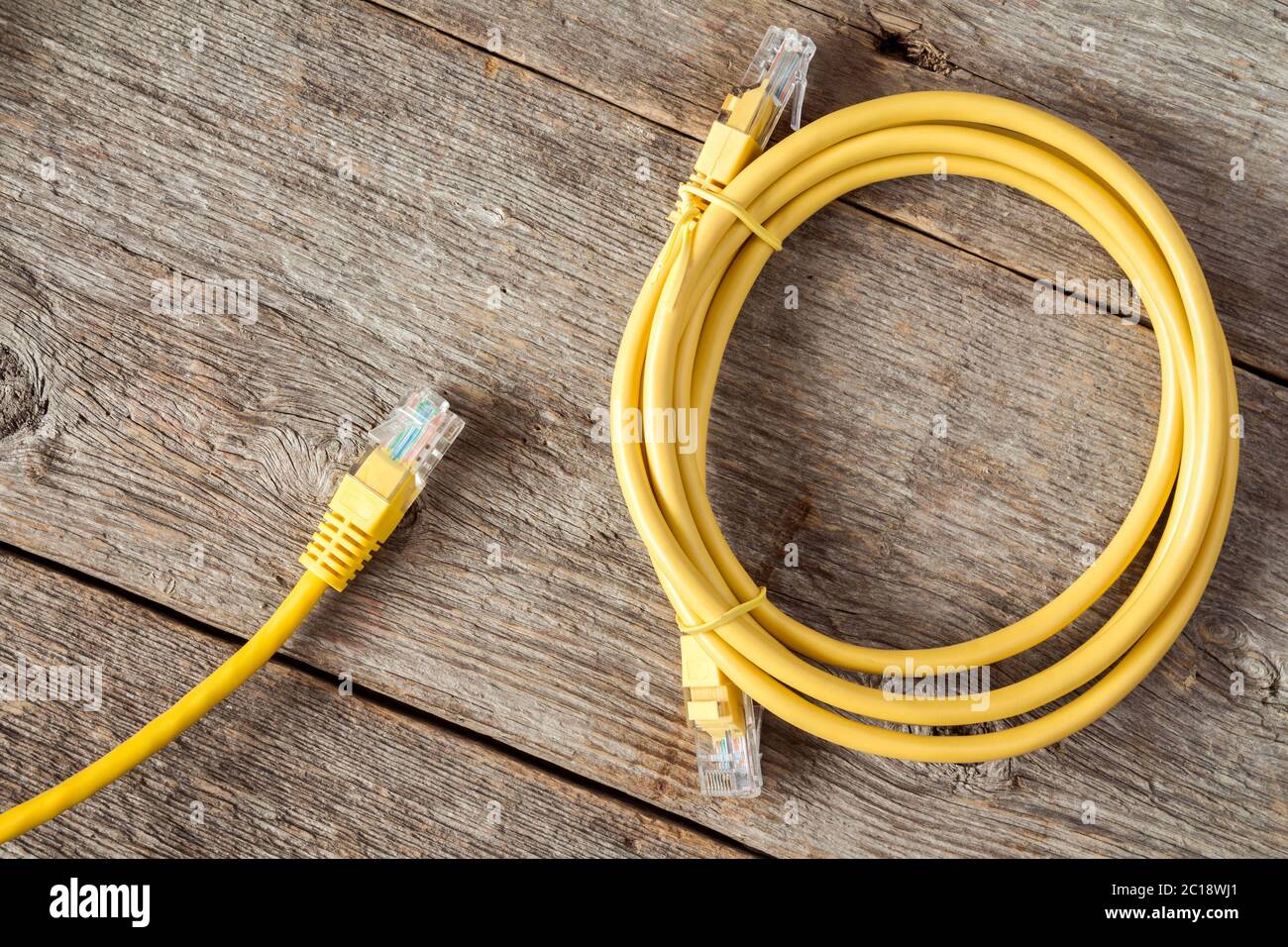 Yellow network cables Stock Photo - Alamy
