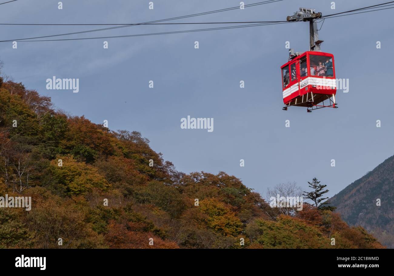 Tourists riding the Akechidaira Ropeway cable car at Nikko, Japan ...