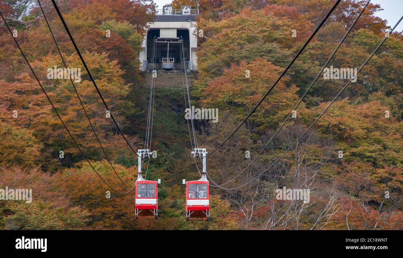 Tourists riding the Akechidaira Ropeway cable car at Nikko, Japan ...
