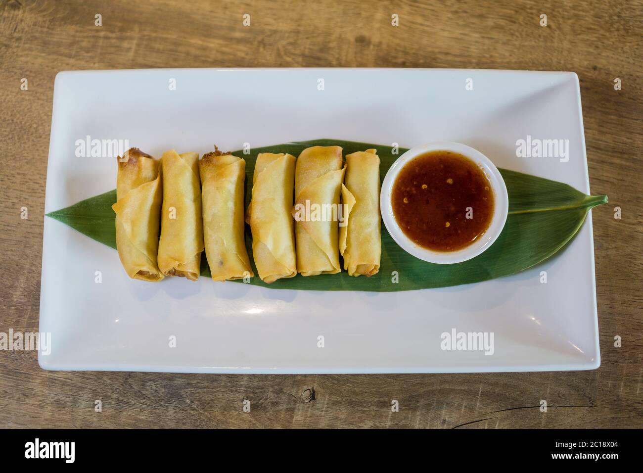 Fried chinese spring rolls with sweet chili sauce Stock Photo - Alamy