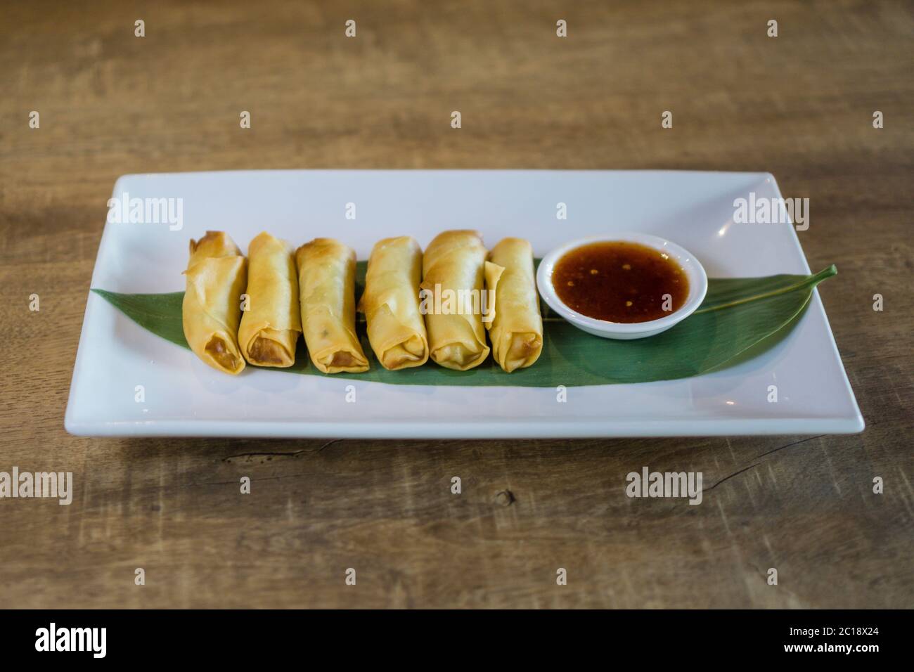 Fried chinese spring rolls with sweet chili sauce Stock Photo - Alamy