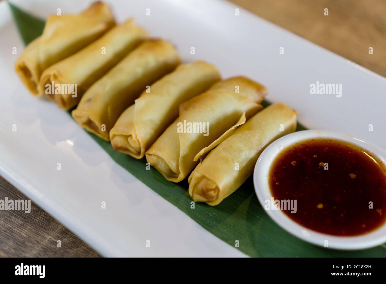 Fried chinese spring rolls with sweet chili sauce Stock Photo - Alamy