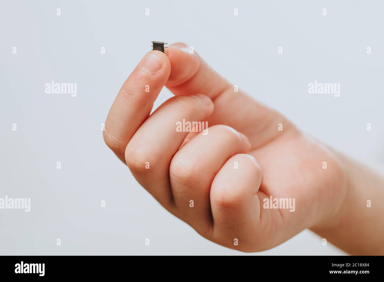 Microchip finger hi-res stock photography and images - Alamy