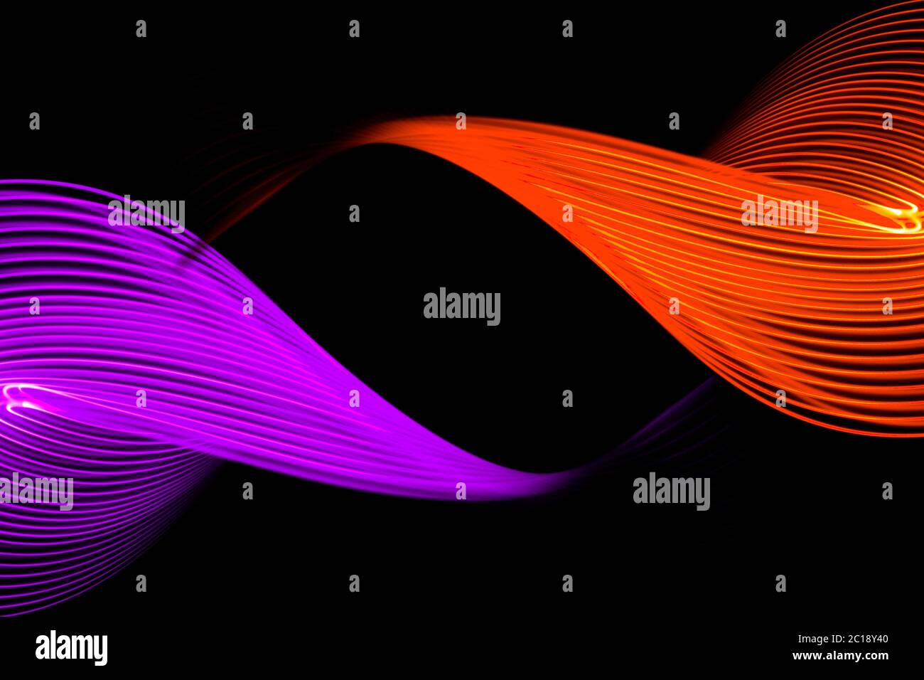 Abstract light orange and purple trails in random motion background ...