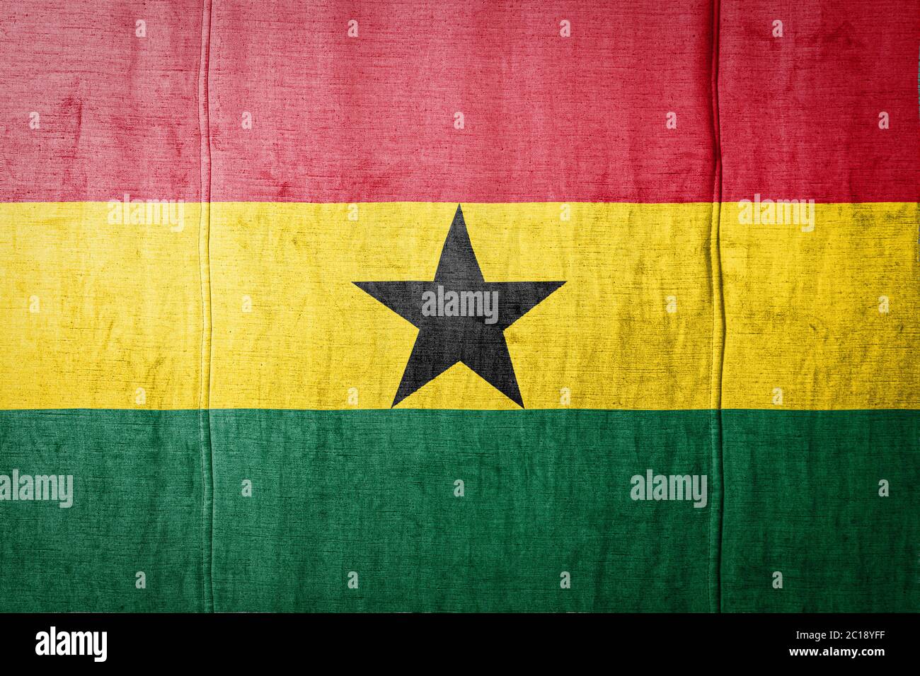 National flag of Ghana depicting in paint colors on old textile. Flag ...