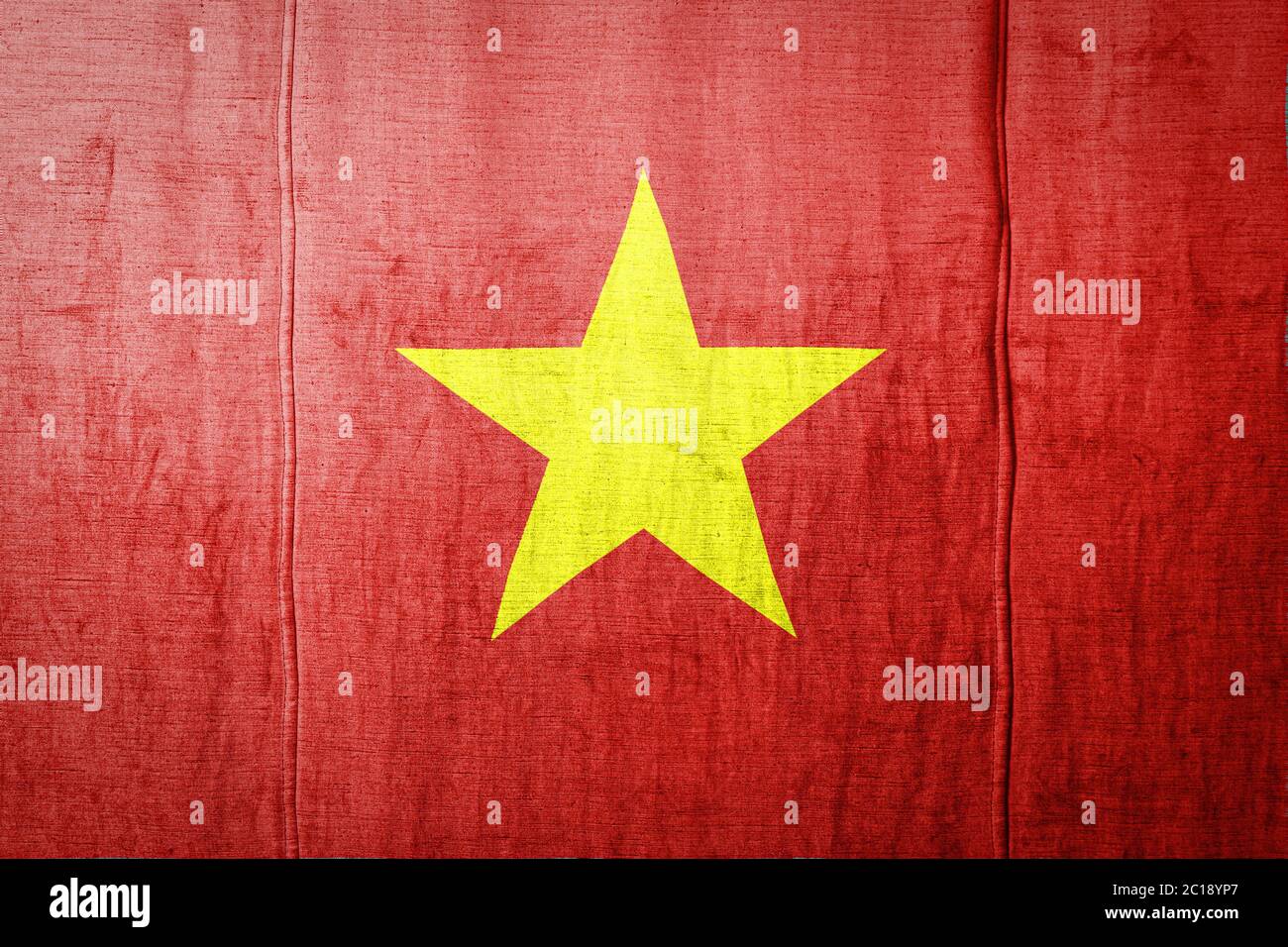 National flag of Vietnam depicting in paint colors on old textile. Flag ...