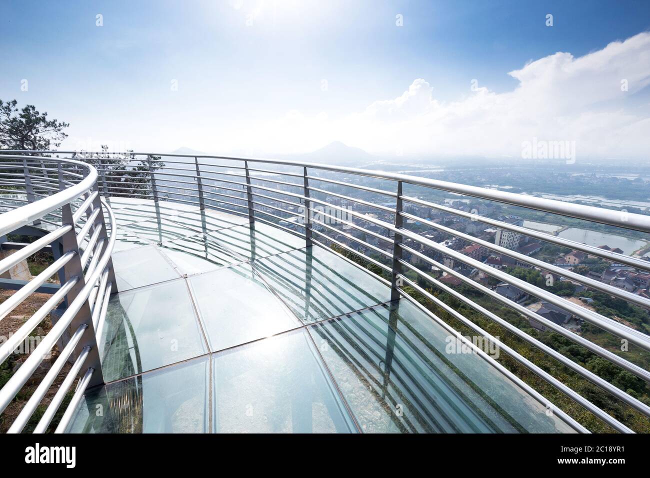 glass pedestrian bridge over hill Stock Photo - Alamy