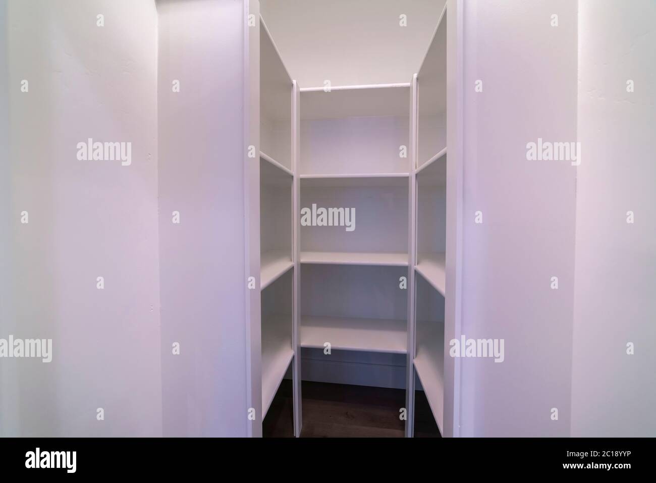 Empty interior of a walk-in wardrobe interior Stock Photo - Alamy