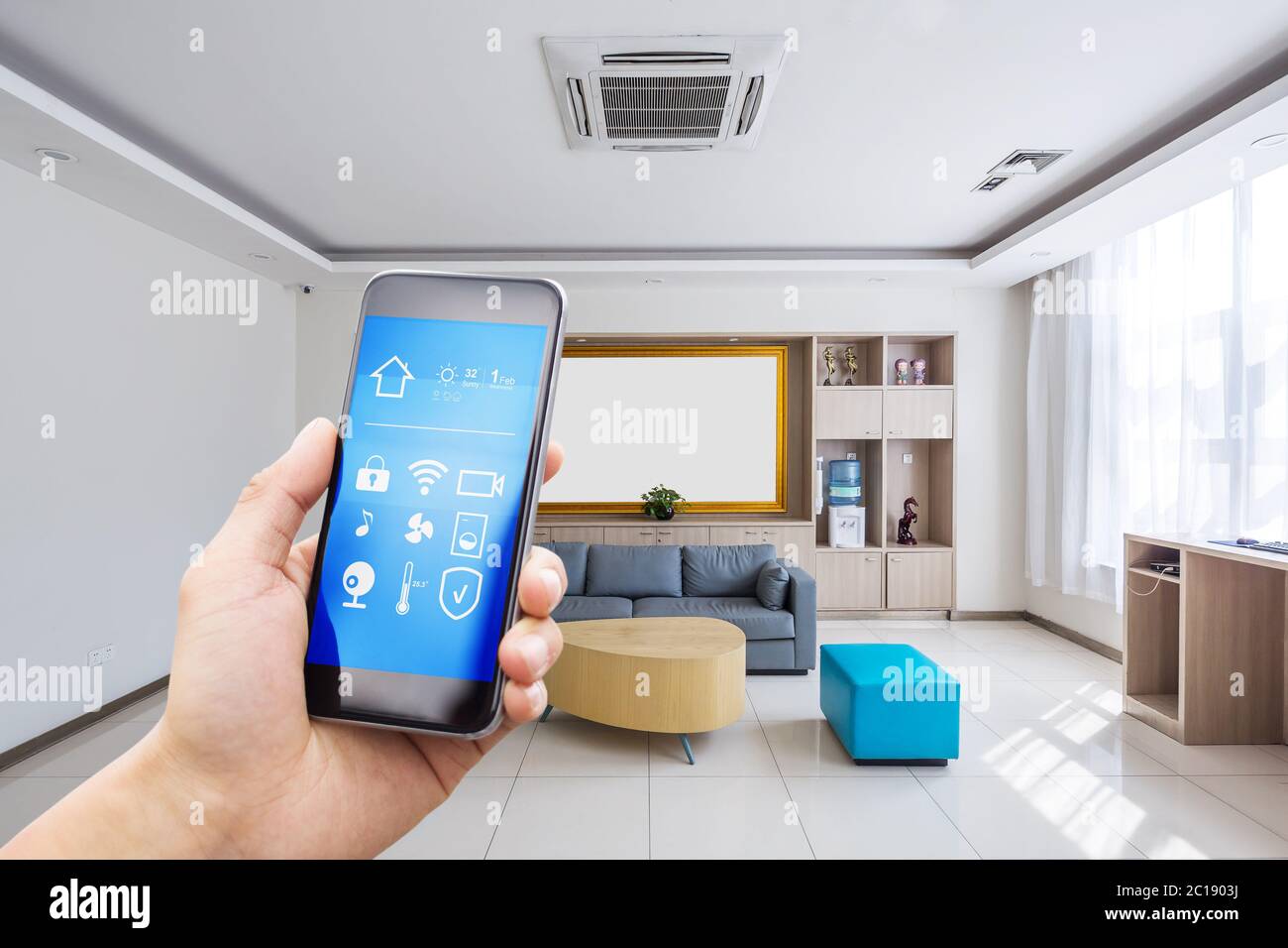 smart phone with smart home in modern living room Stock Photo - Alamy