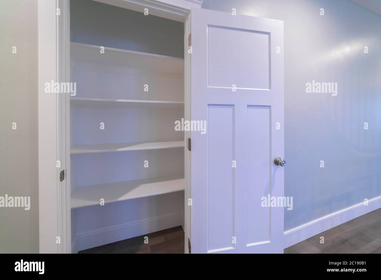 Open empty fitted cupboard or wardrobe interior Stock Photo - Alamy