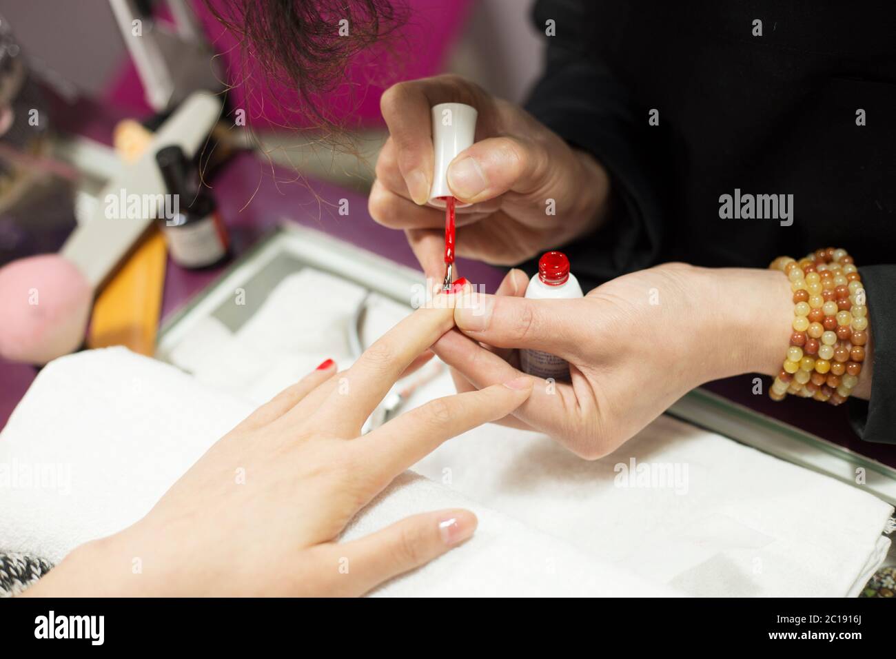 nail paintings service Stock Photo - Alamy