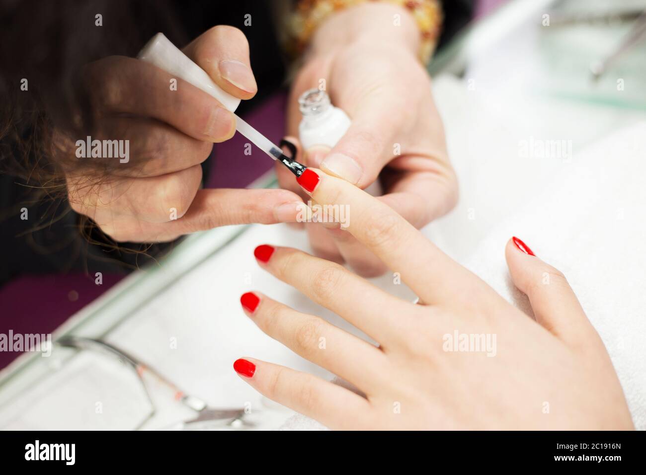 nail paintings service Stock Photo - Alamy