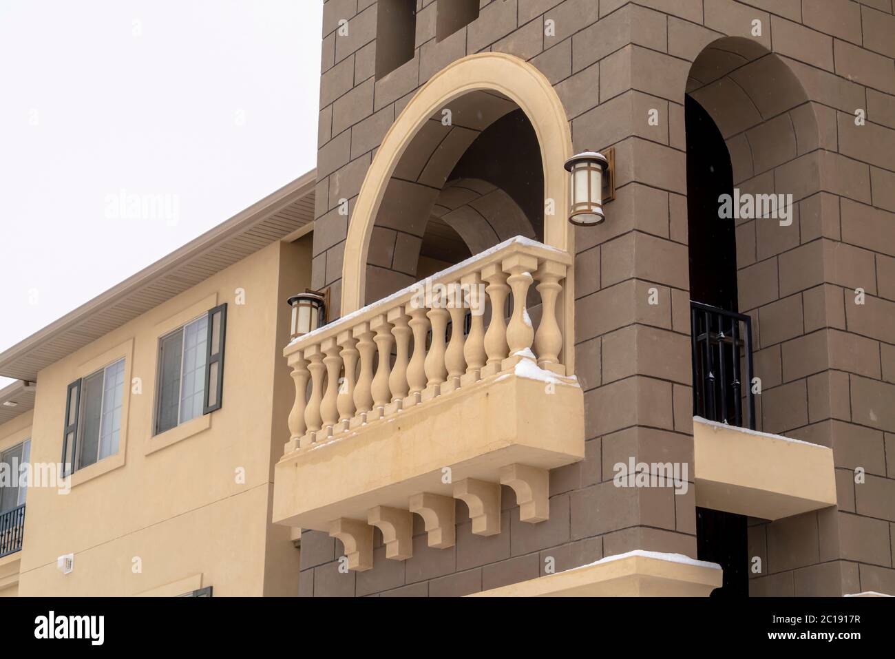 Exterior of apartment with moulded white balustrade on the arched ...