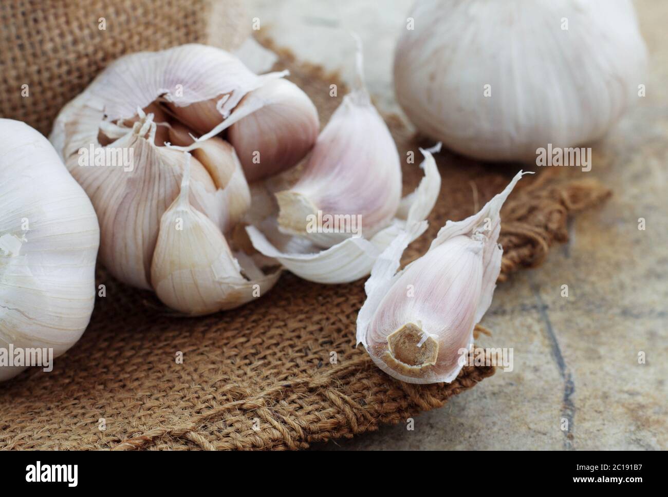 garlic on sack Stock Photo - Alamy