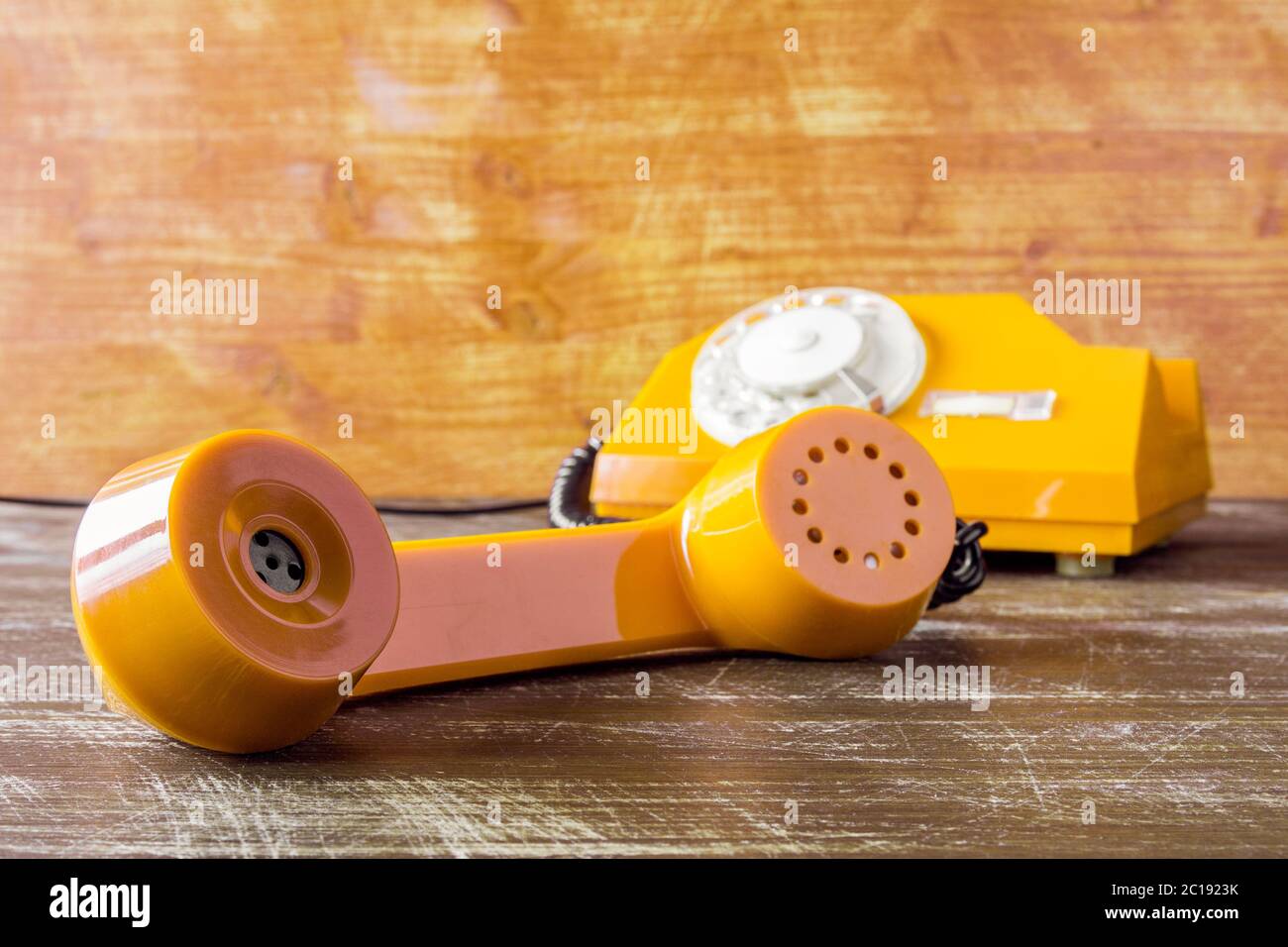 Yellow vintage classic telephone Stock Photo - Alamy