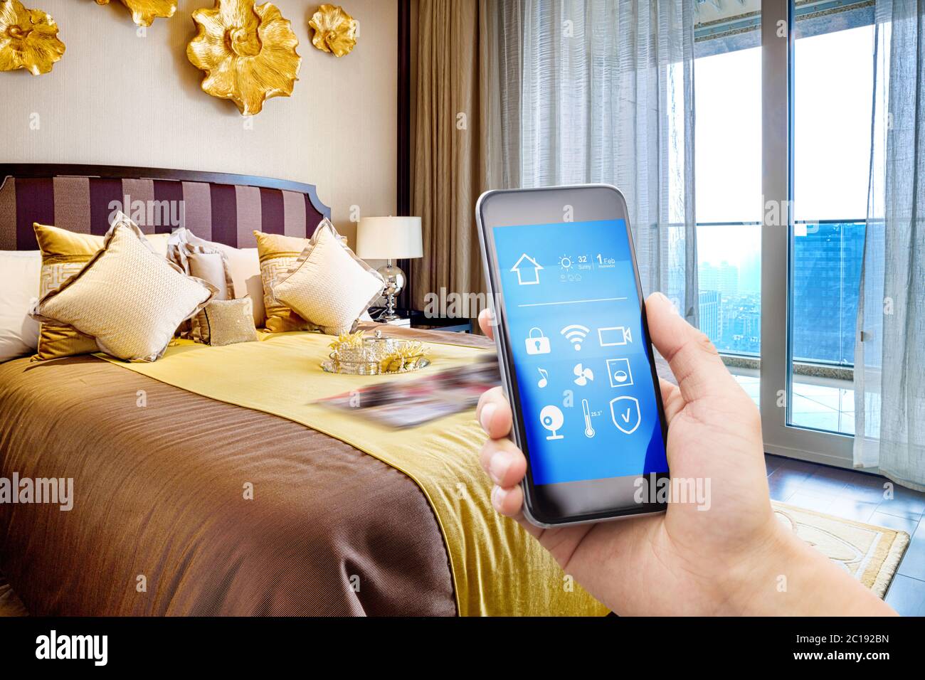 smart phone with smart home with modern bedroom Stock Photo - Alamy