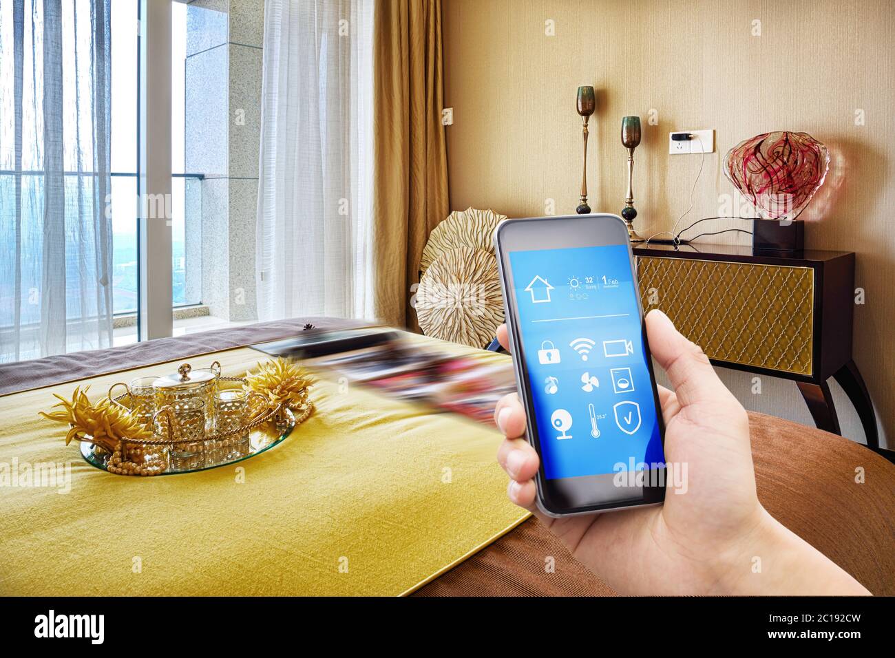 smart phone with smart home with modern bedroom Stock Photo - Alamy