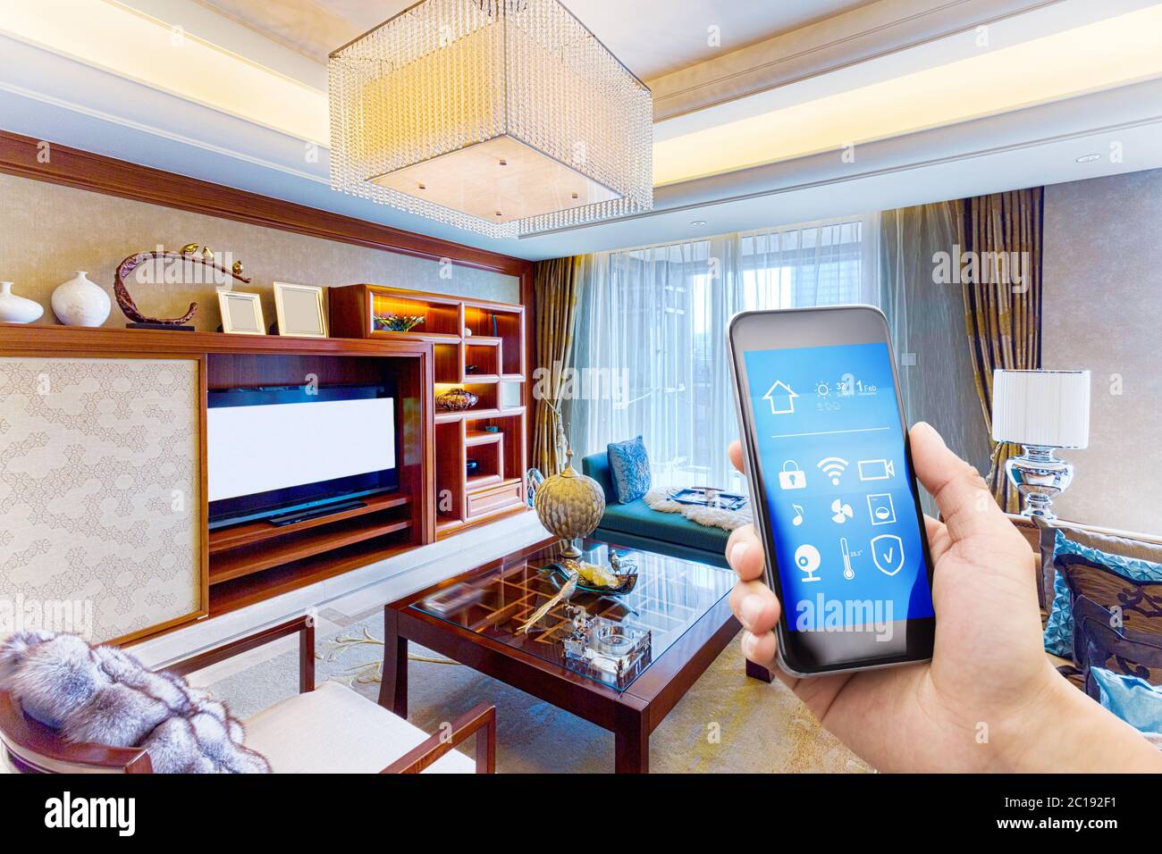 smart phone with smart home with modern living room Stock Photo - Alamy