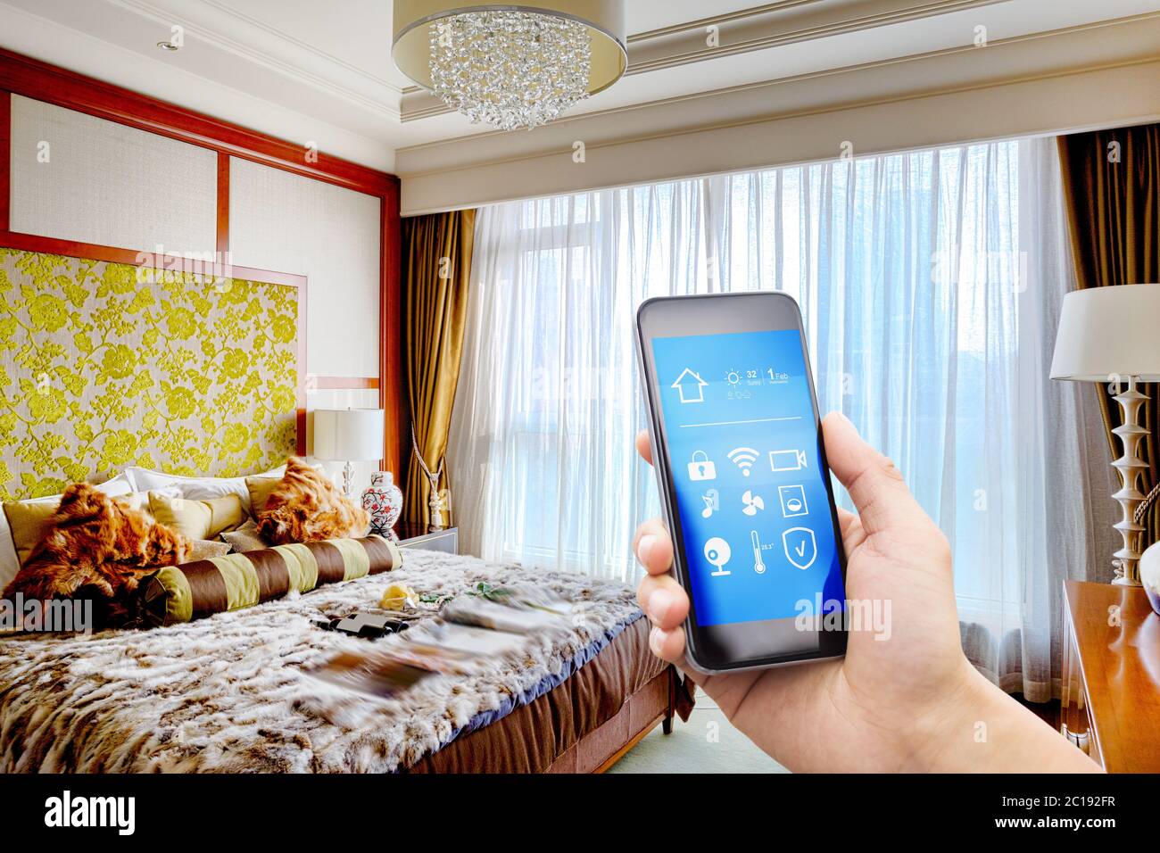 smart phone with smart home with modern bedroom Stock Photo - Alamy