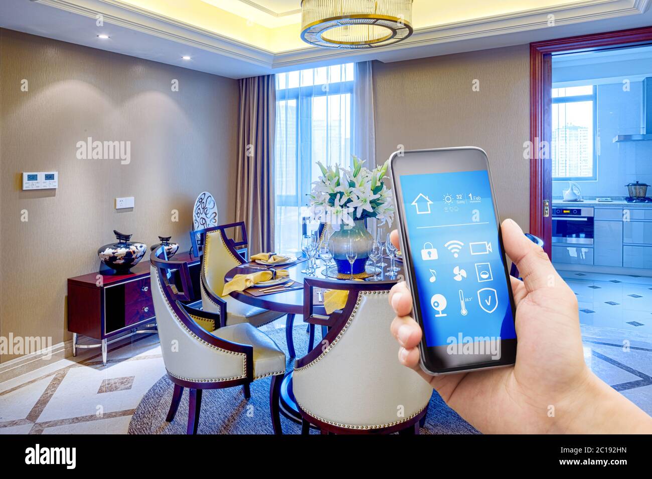 smart phone with smart home with modern dining room Stock Photo - Alamy