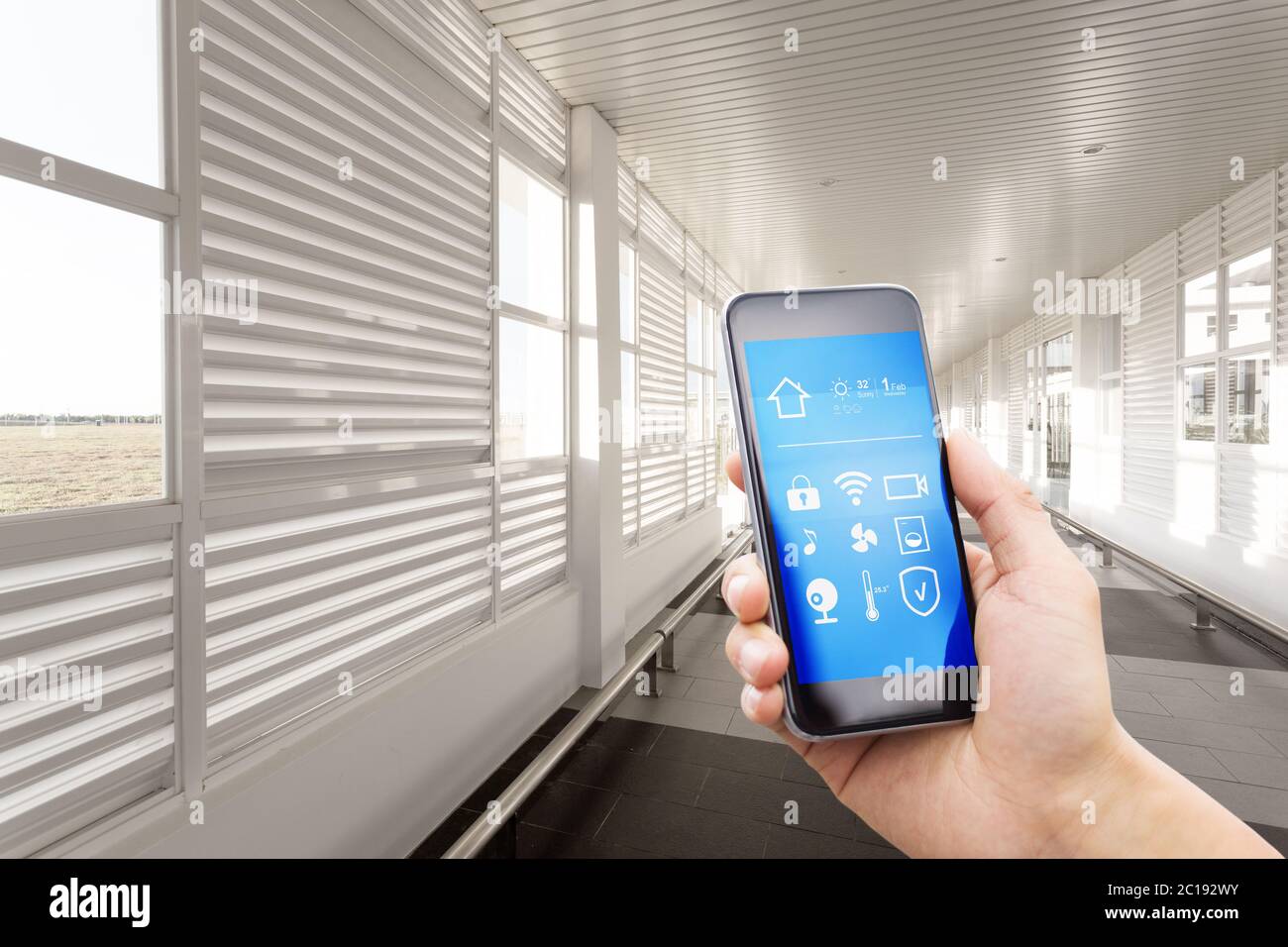 smart phone with smart home with modern corridor Stock Photo - Alamy